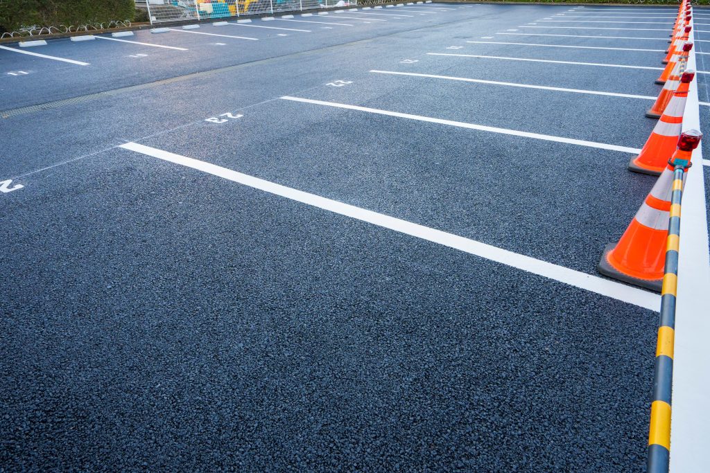 3 Signs It's Time to Repave Your Parking Lot - J&J Asphalt
